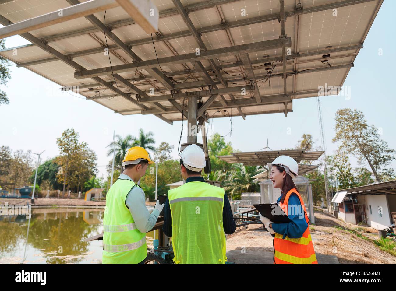 Teamwork and Solar Project Planning. Discussing installation strategies ...