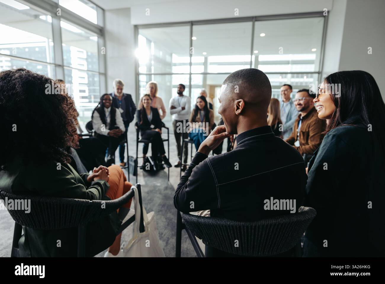 Multiethnic employees participating in an interactive workshop within a ...