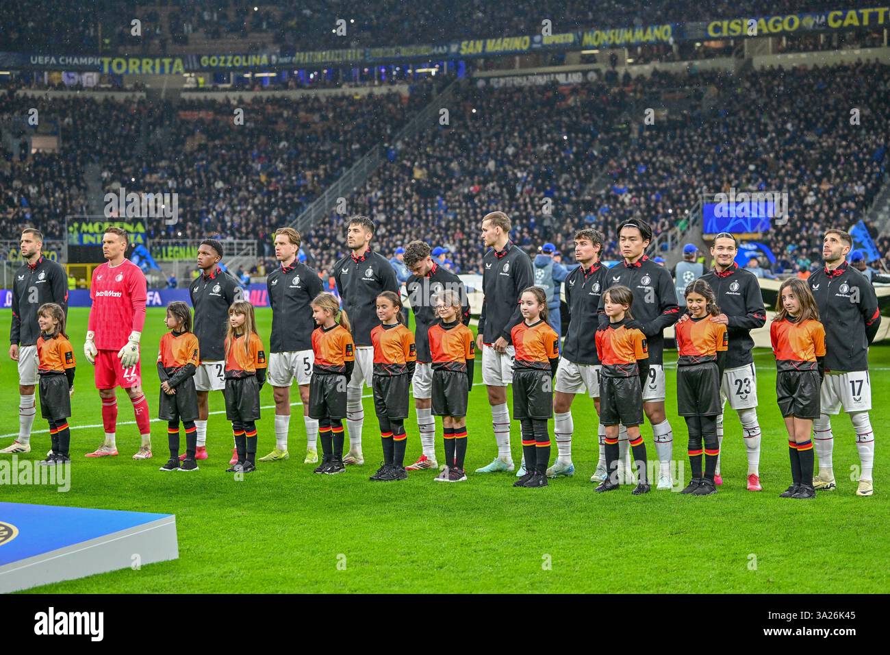 Milano, Italy. 11th Mar, 2025. The players of Feyenoord line up for the ...