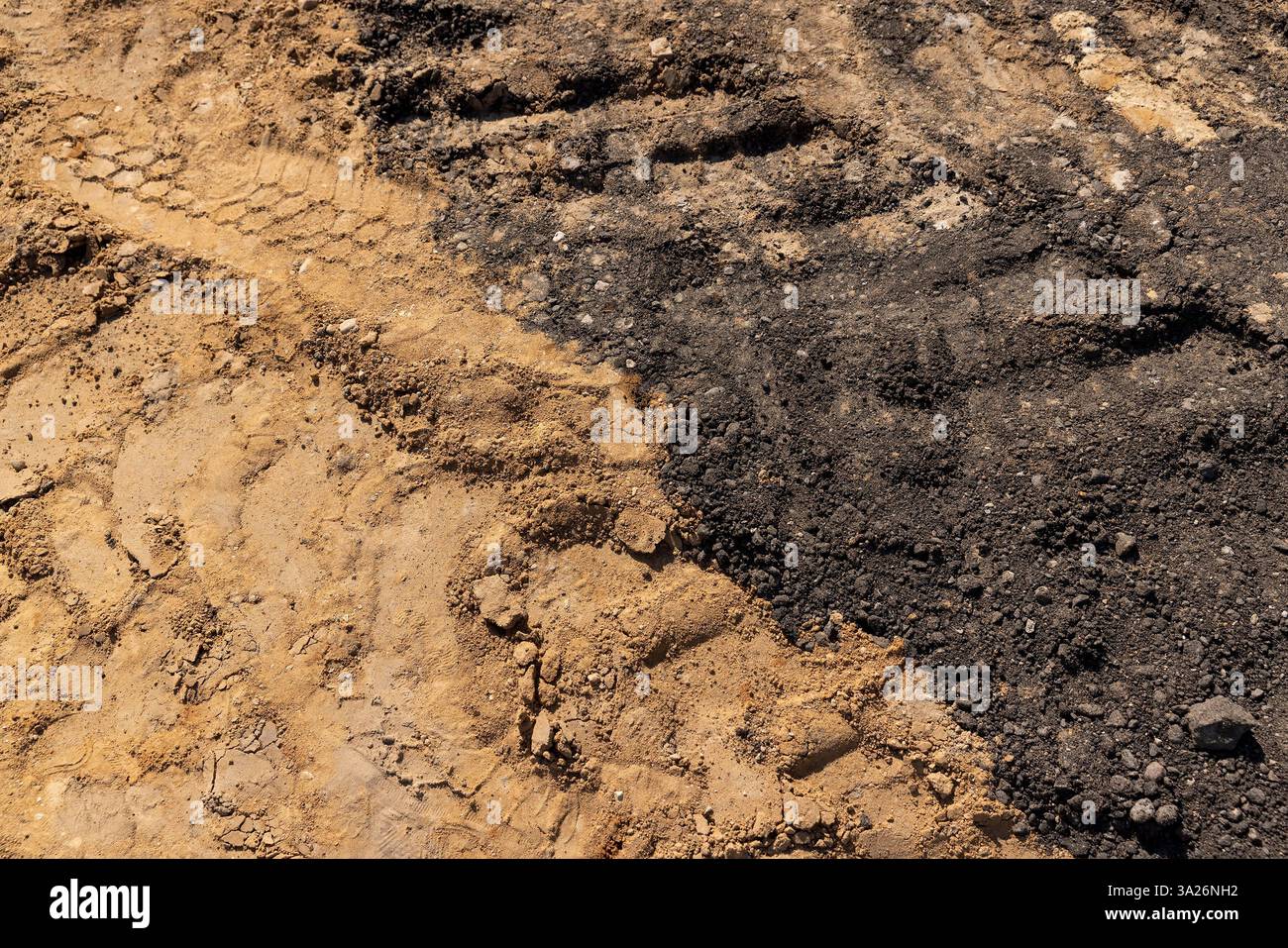 road construction work during the excavation of a pit for laying ...