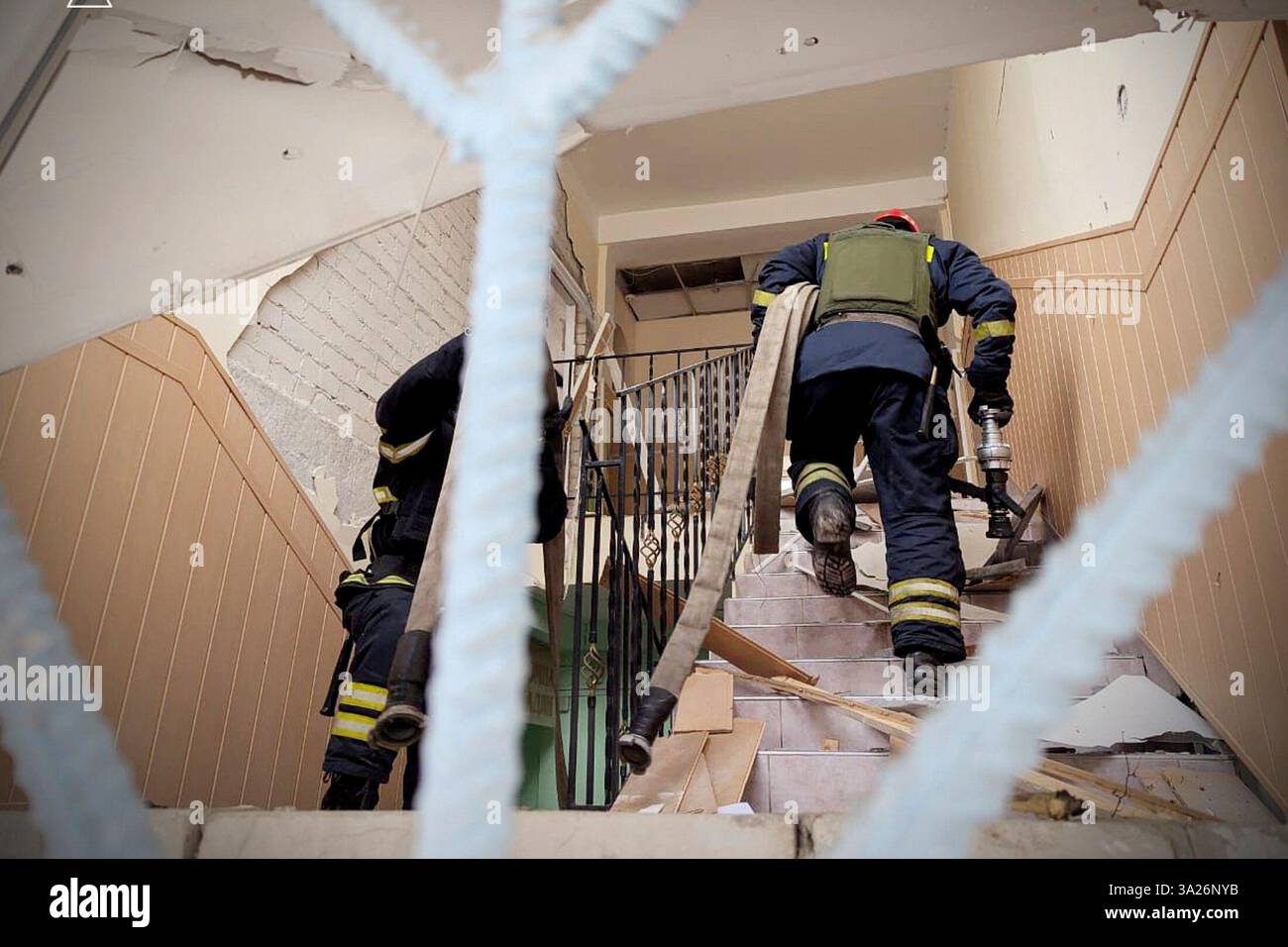 In this photo provided by the Ukrainian Emergency Service, firefighters ...