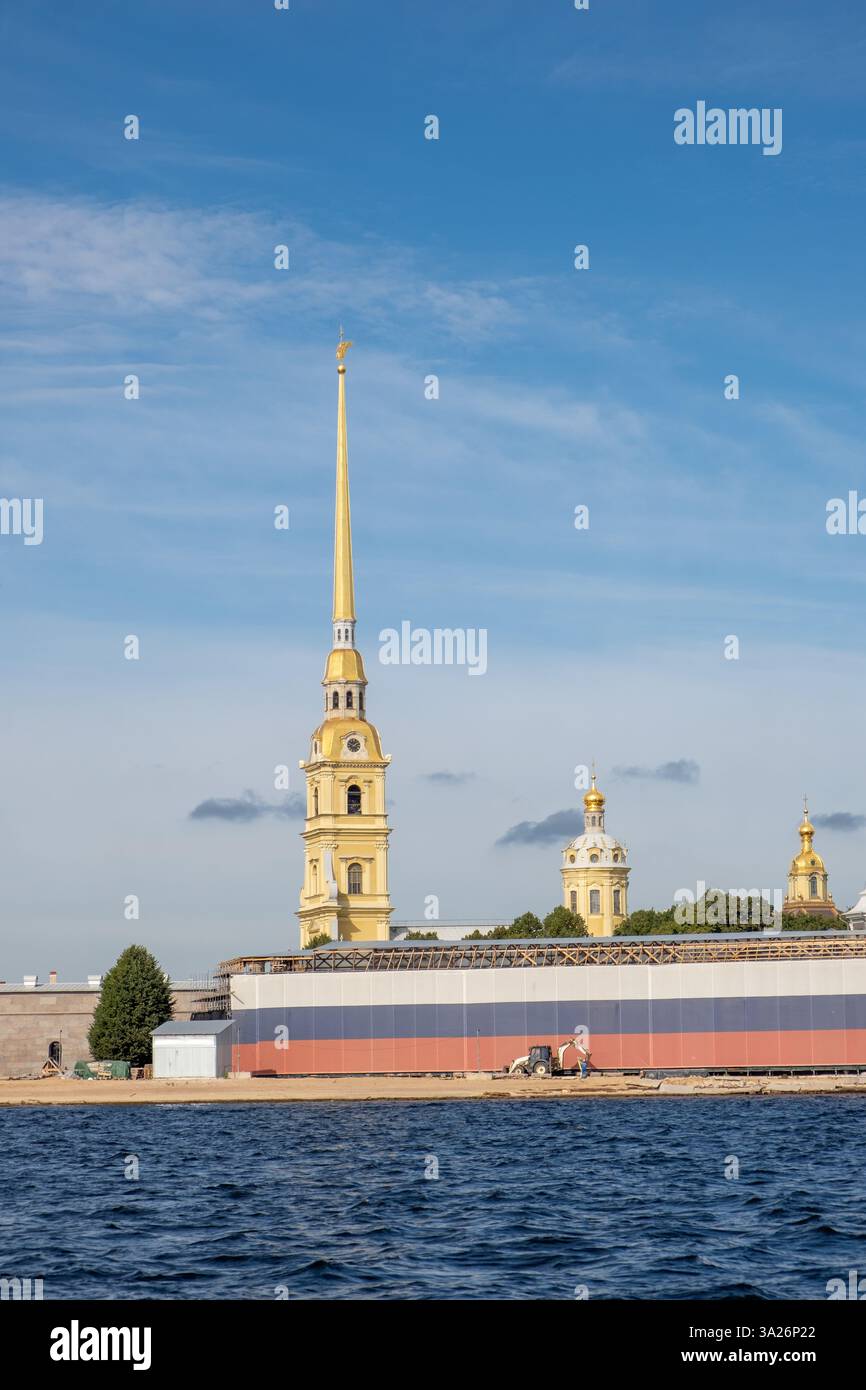 Visitors admire the iconic Peter and Paul Fortress with its towering ...