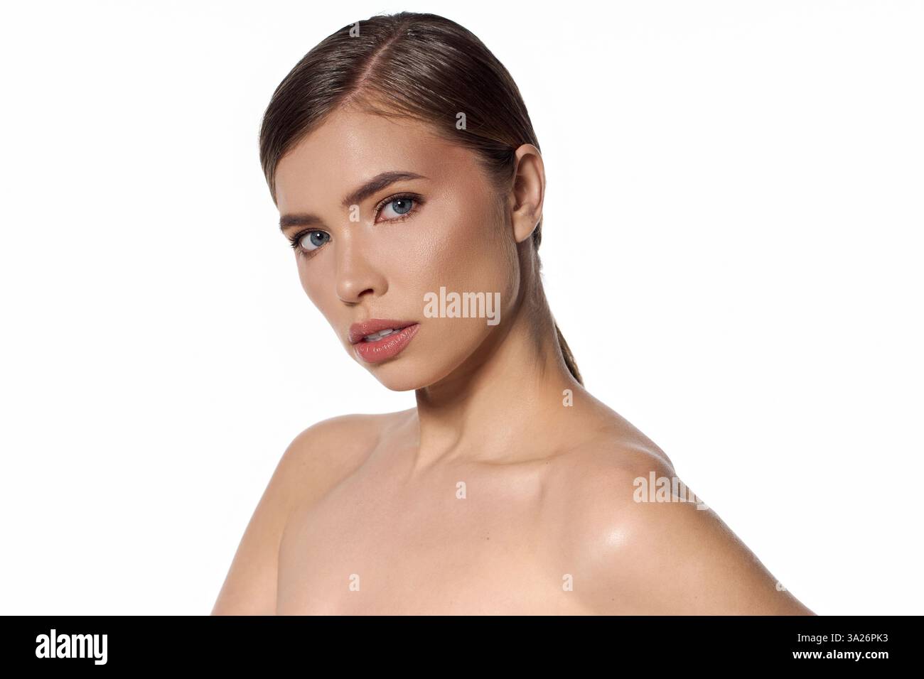 A young woman displays her chic style and elegance with a captivating ...