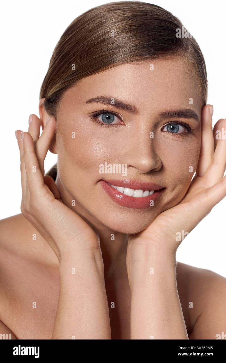 With a charming smile, the elegant woman highlights her timeless beauty and chic style Stock ...