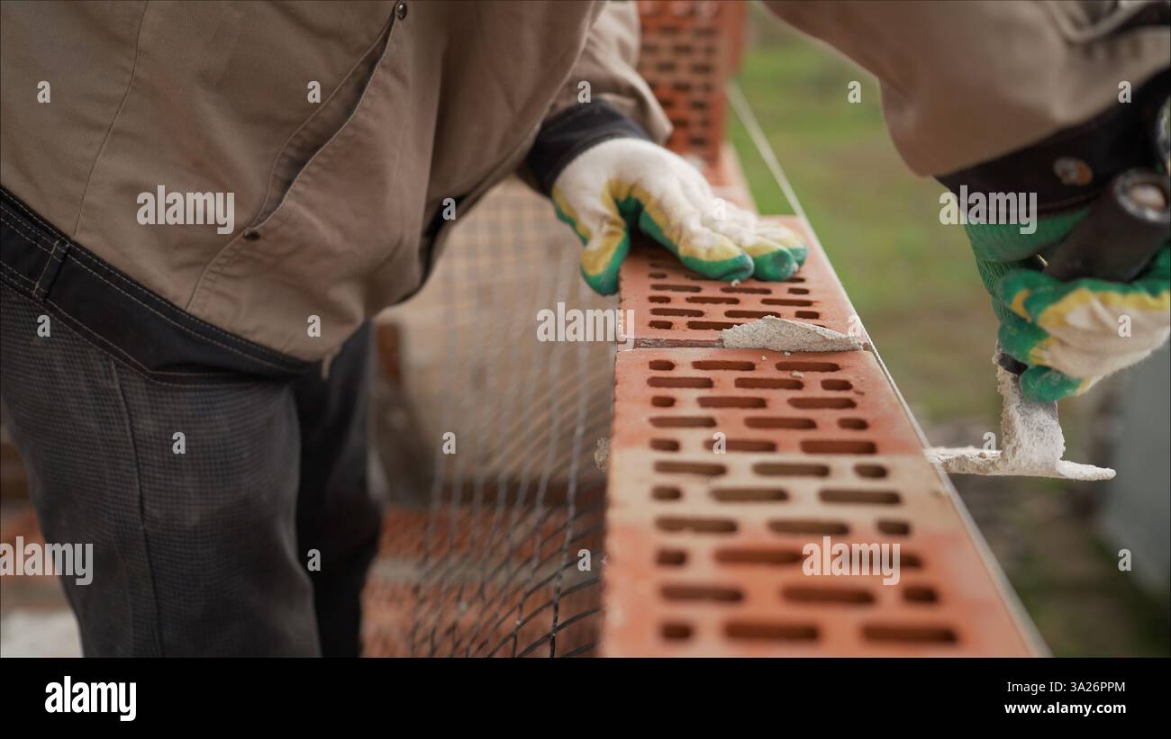Close up shot bricklayer builds hi-res stock photography and images - Alamy