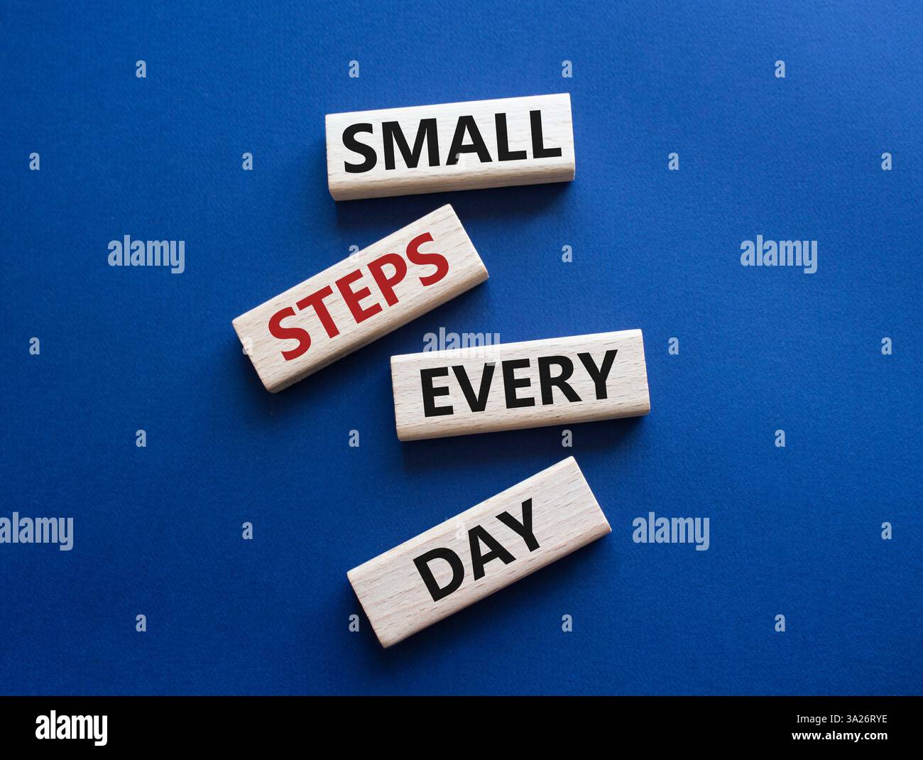 Small Steps Every Day symbol. Wooden blocks with words Small Steps ...