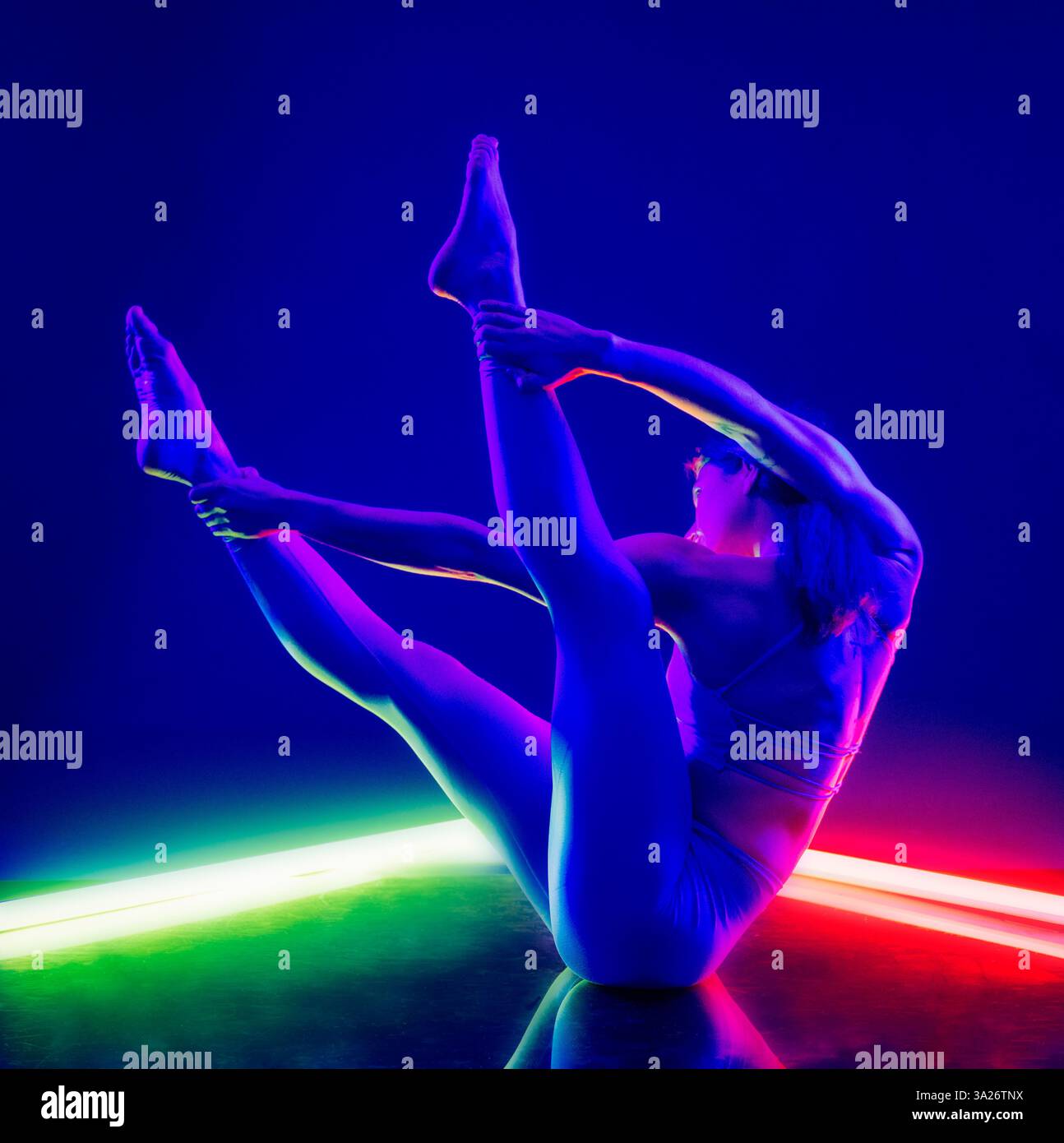 Silhouette woman gracefully stretching in hi-res stock photography and ...