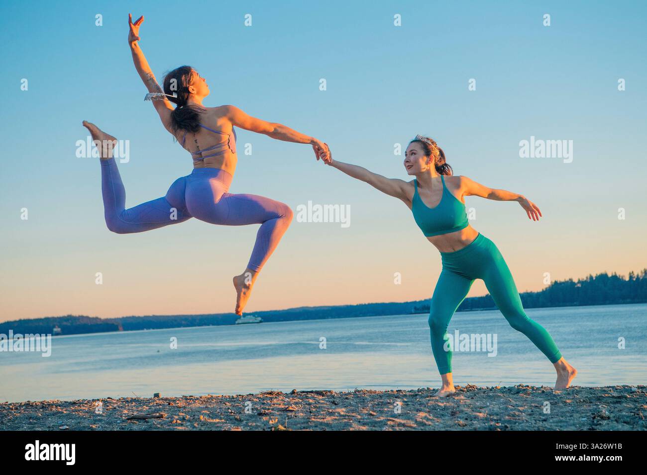 Acrobatic jump duo hi-res stock photography and images - Alamy
