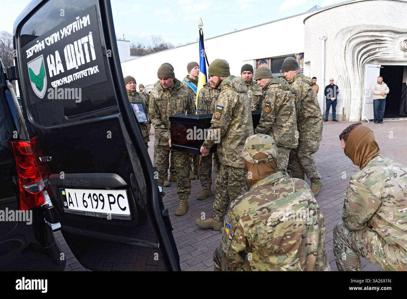 Non Exclusive: Soldiers put the coffin of Dominic Bryce Abelen, a 28 ...