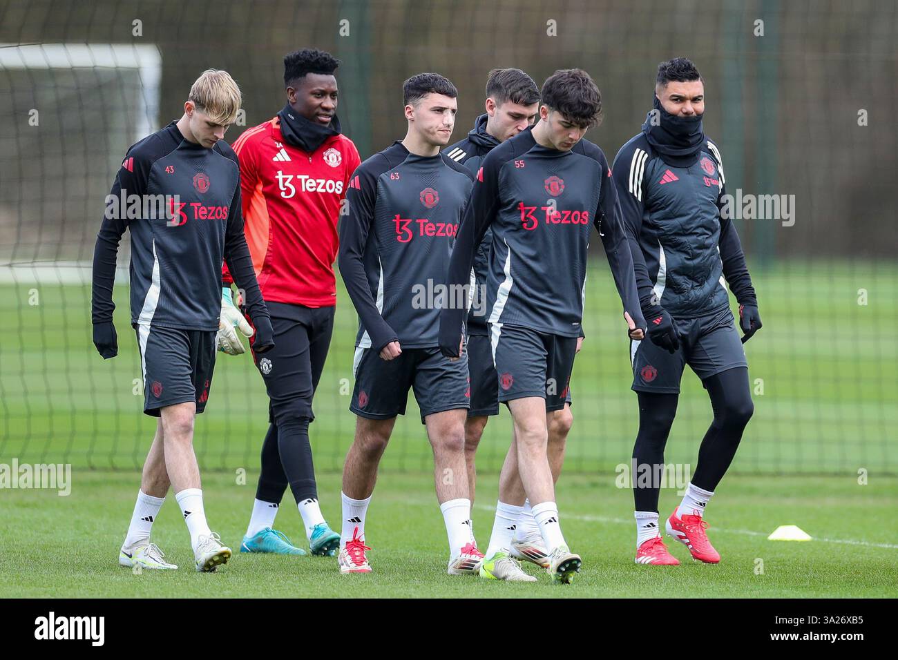 Manchester, UK. 12th Mar, 2025. Manchester United midfielder Toby ...