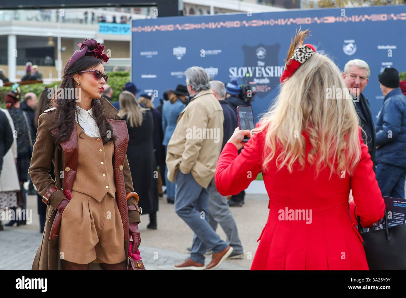 racegoers take photos as they begin to arrive at the Cheltenham ...