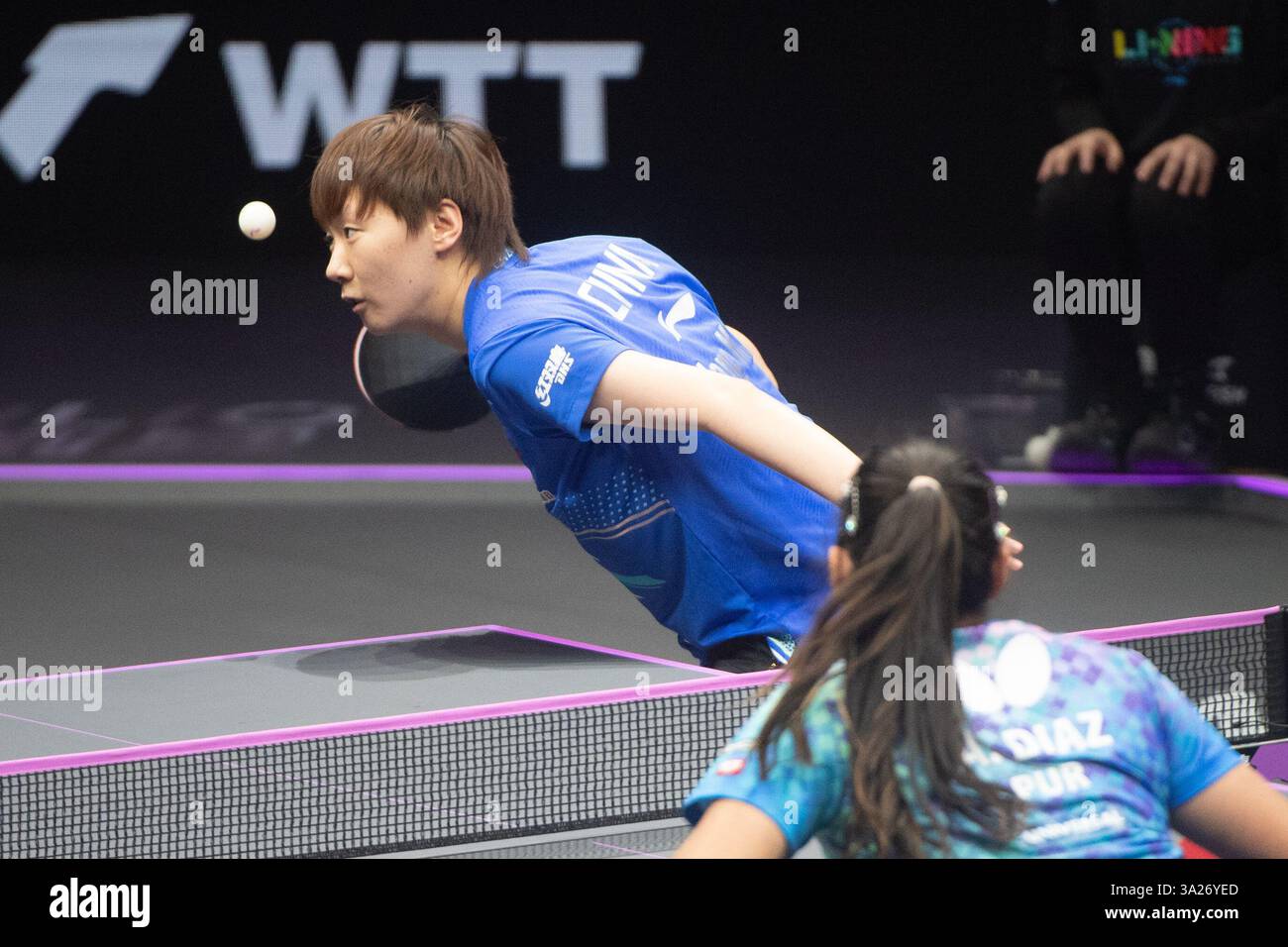 Chongqing, China. 12th Mar, 2025. Wang Manyu of China serves during the ...