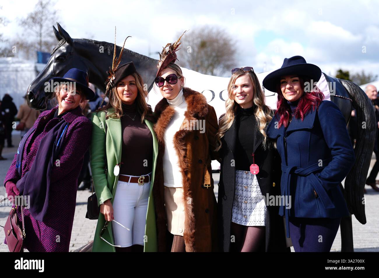 Racegoers arrive for day two of the 2025 Cheltenham Festival at ...