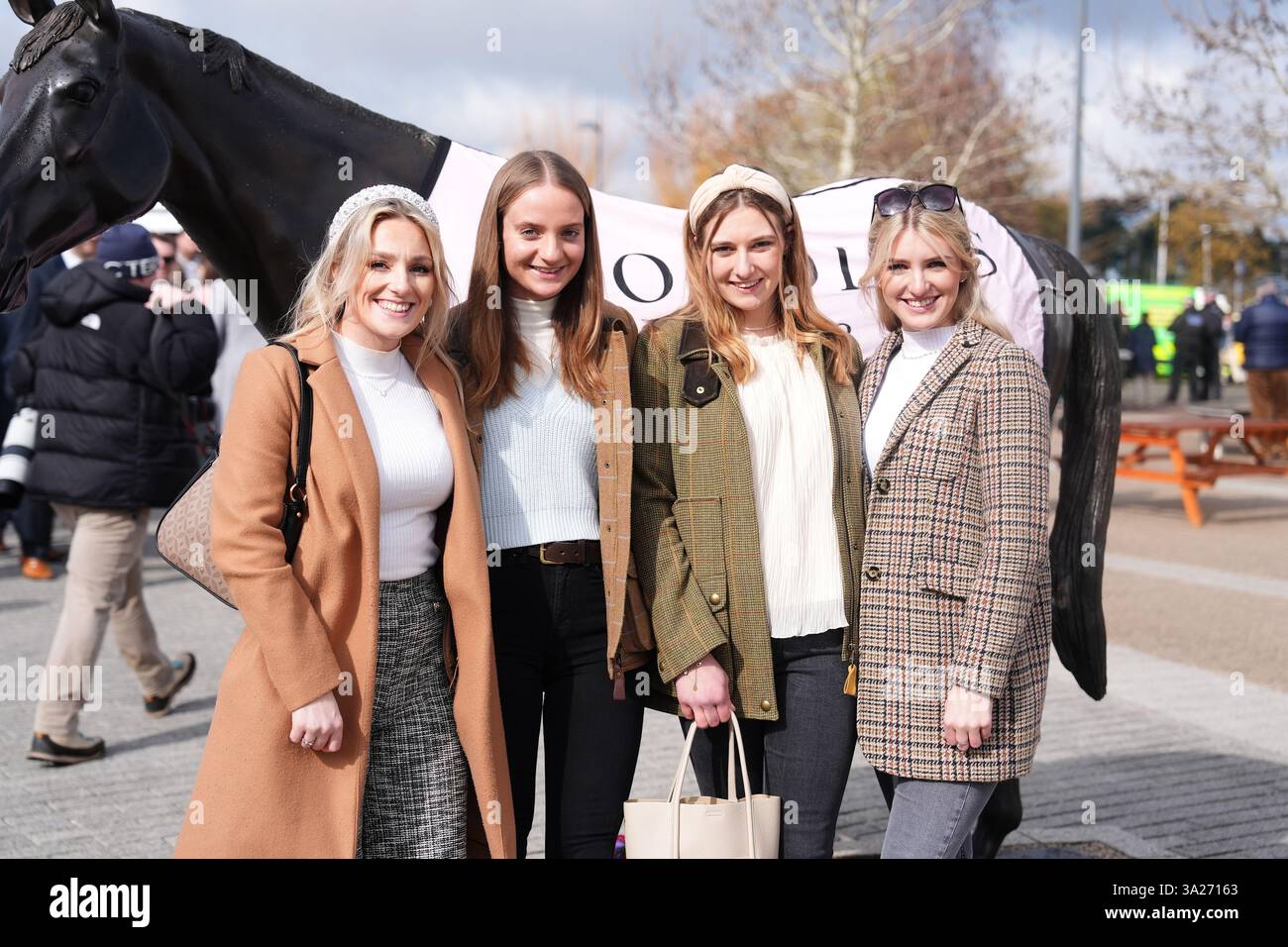 Racegoers arrive on day two of the 2025 Cheltenham Festival at ...