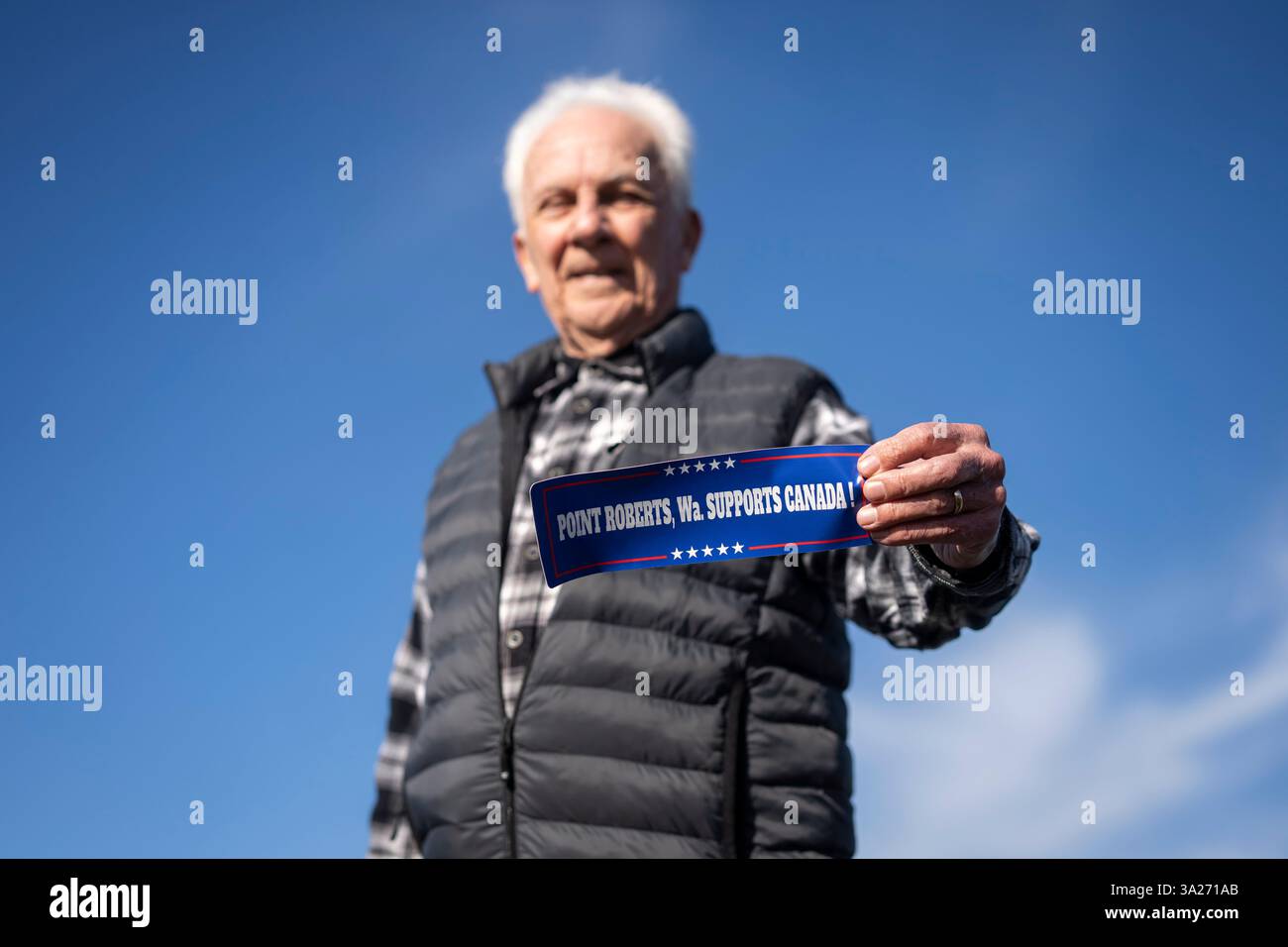 Point Roberts, United States. 05th Mar, 2025. Brian Calder holds a ...