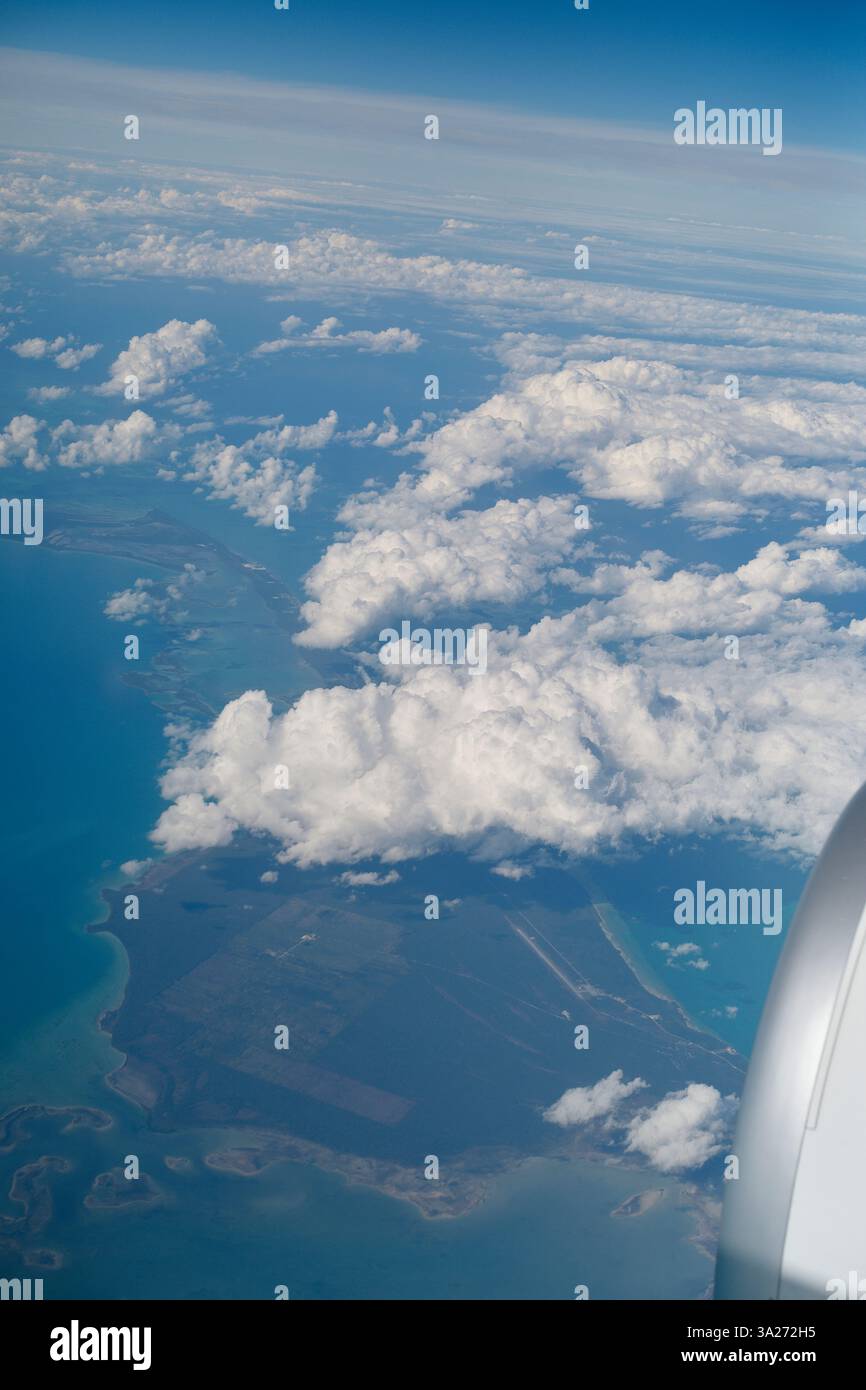 Aerial view of Florida Keys and clouds over turquoise ocean waters with ...