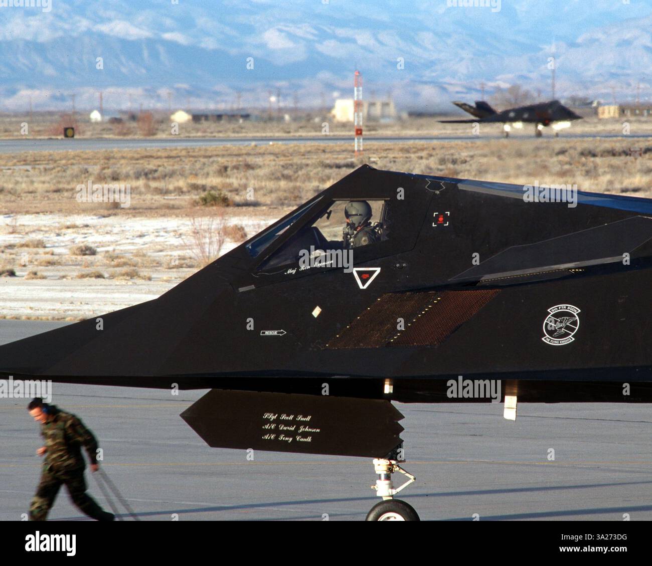 Feb 19, 1999; Holloman, NM, USA; Ground crew prepare an F-117 ...