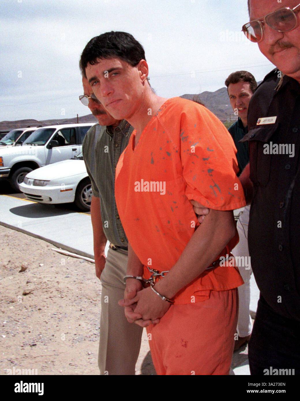 Apr 12, 1999; Truth or Consequences, NM, USA; Murder suspect DENNIS ROY YANCY being escorted ...