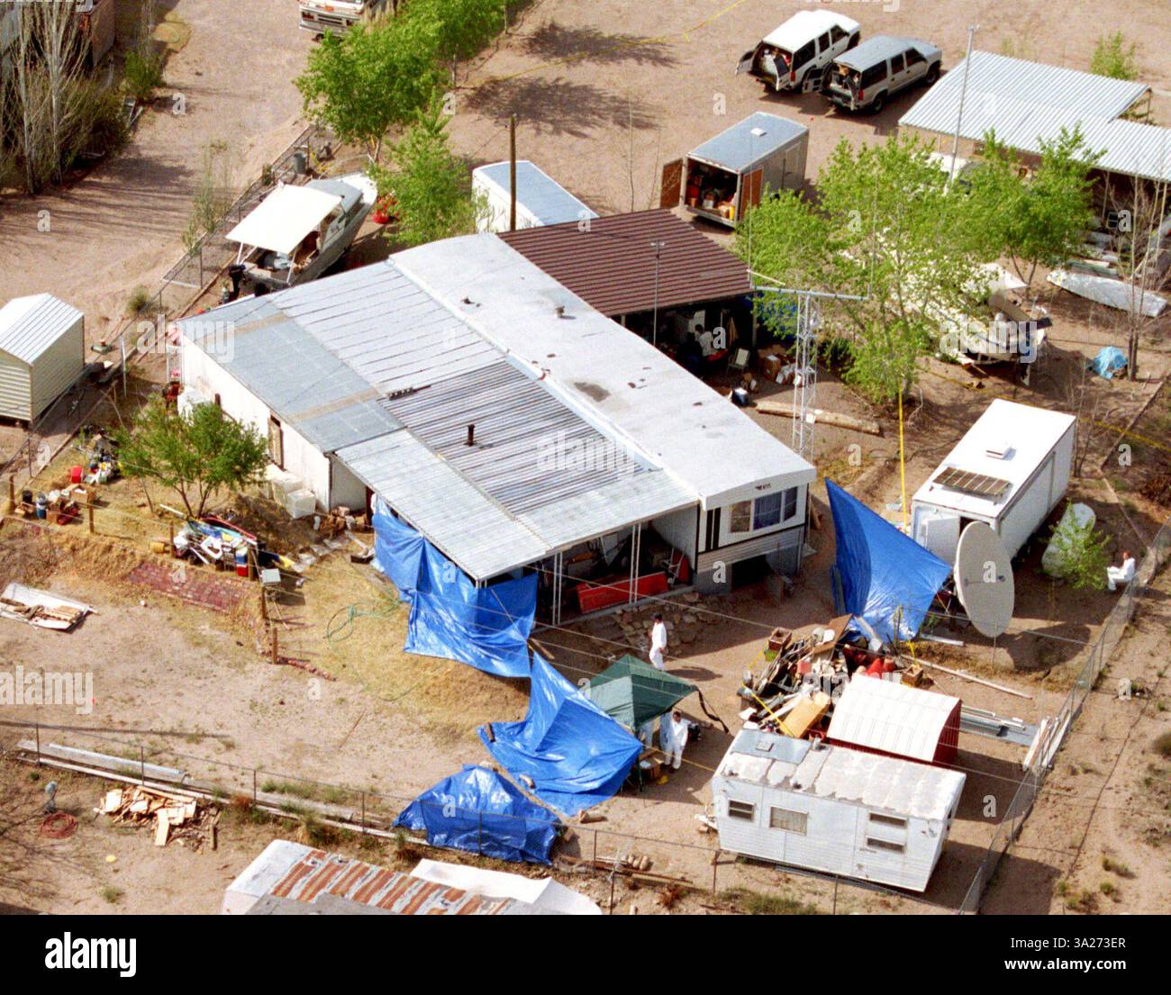 Mar 30, 1999; Elephant Butte, NM, USA; Members of the FBI Evidence Unit ...
