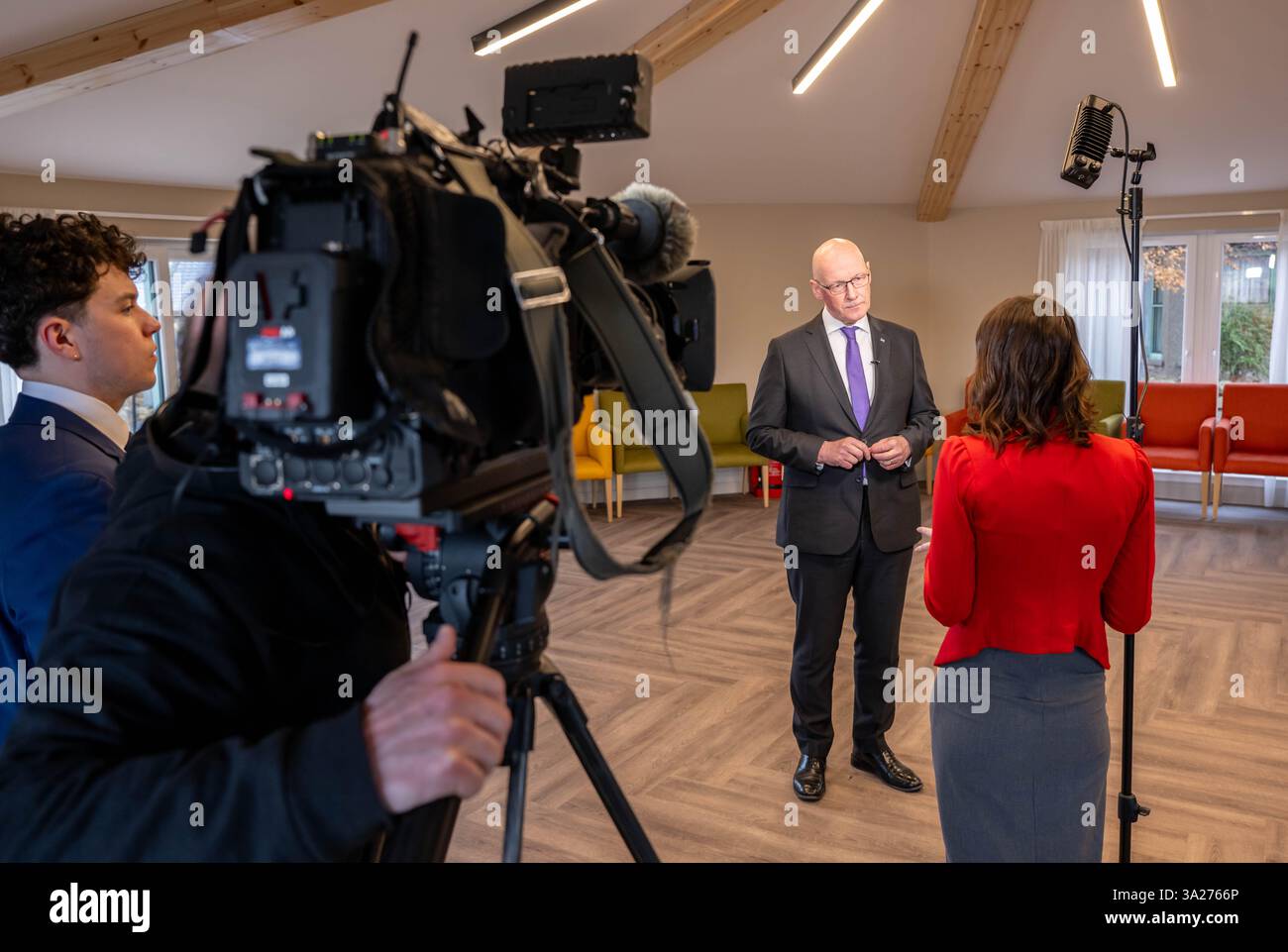 First Minister of Scotland John Swinney speaks to the media during a ...