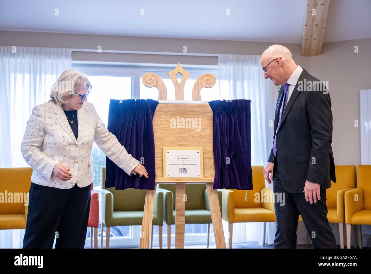 First Minister of Scotland John Swinney unveils a plaque to officially ...