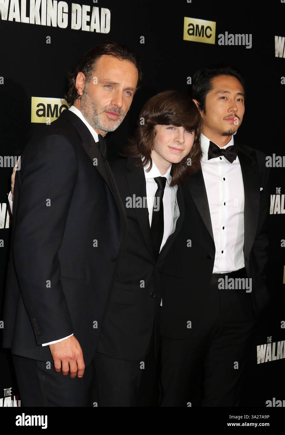 Actors Andrew Lincoln (L), Chandler Riggs and Steven Yeun arriving at ...