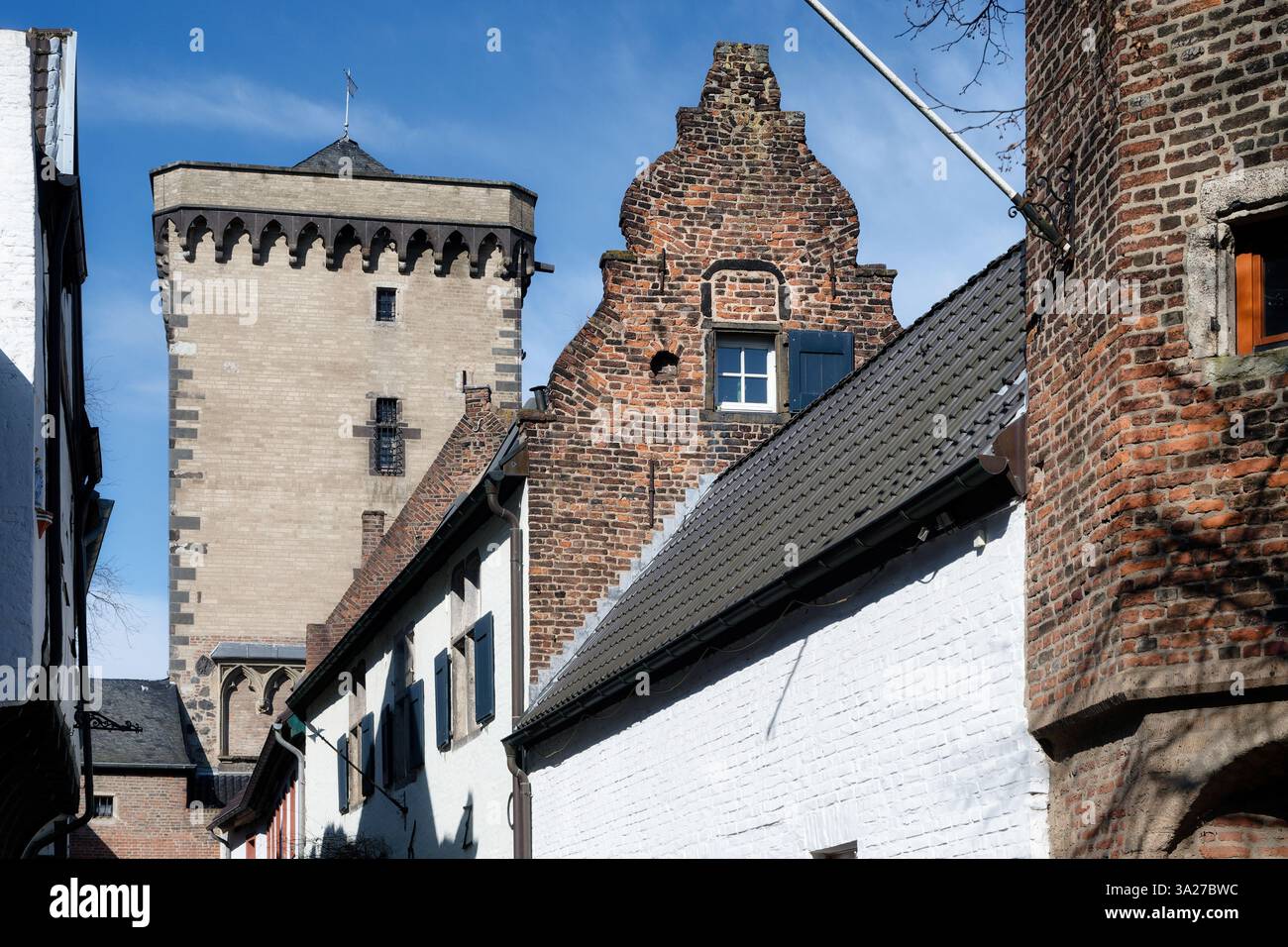 The mighty Rhine Tower in the historic old town of Zons, which also ...