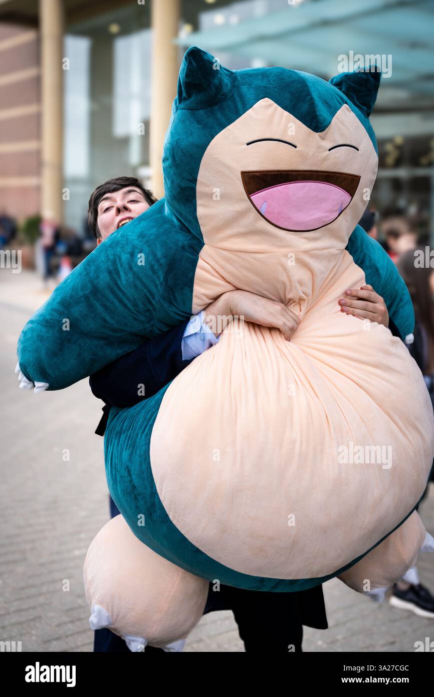 YORK, UK - MARCH 2, 2025. An excited and funny adult male hugging a ...