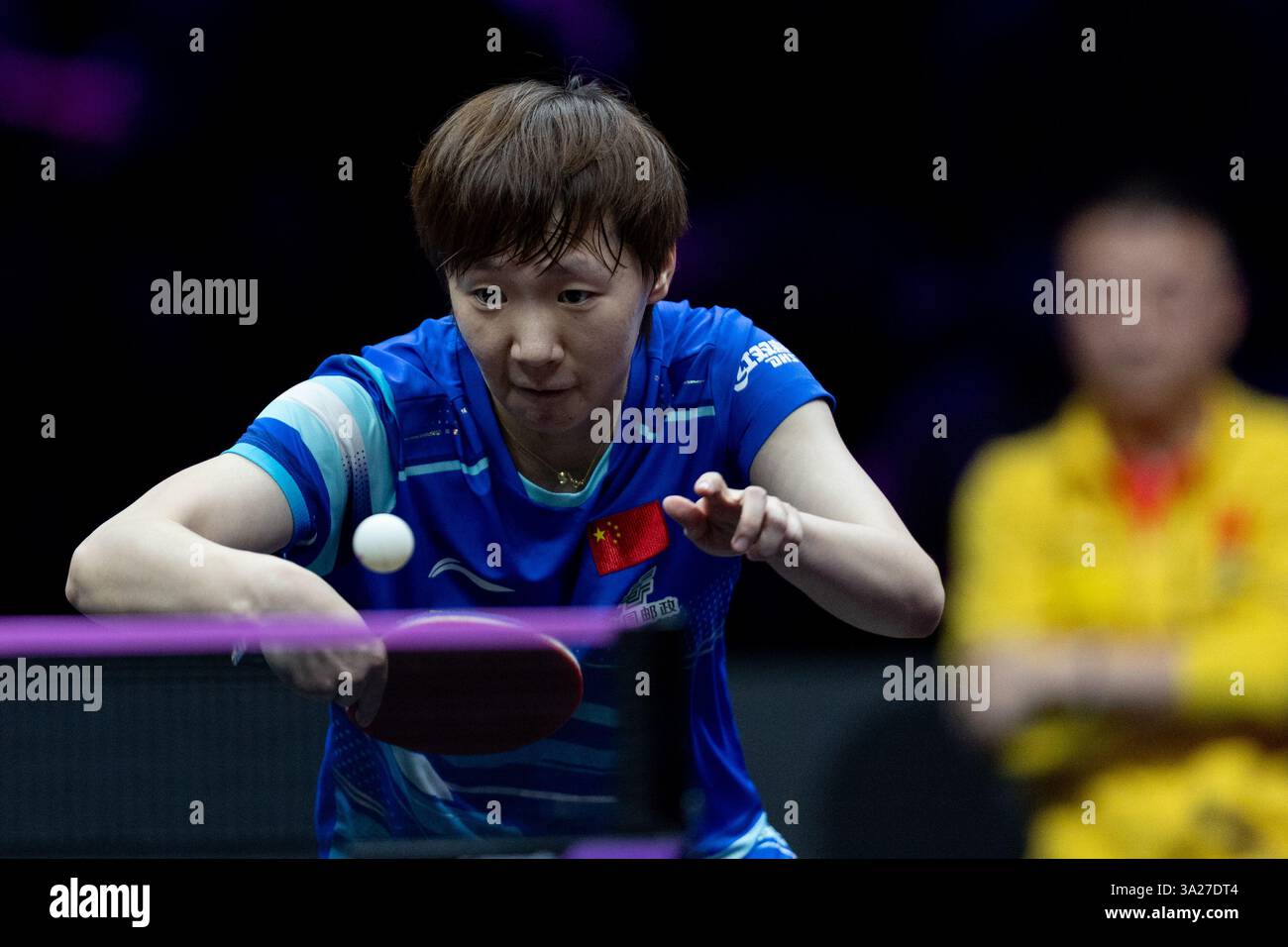 Chongqing, China. 12th Mar, 2025. Wang Manyu of China hits a return ...