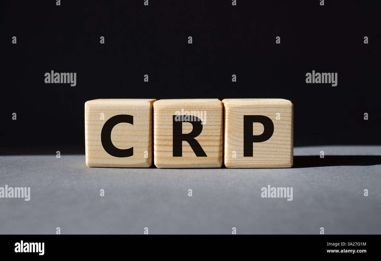 CRP - C-Reactive Protein Test symbol. Wooden cubes with word CRP ...