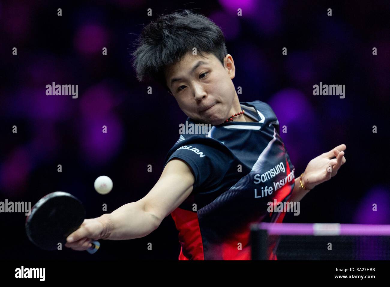 Chongqing, China. 12th Mar, 2025. Joo Cheon-hui of South Korea hits a ...