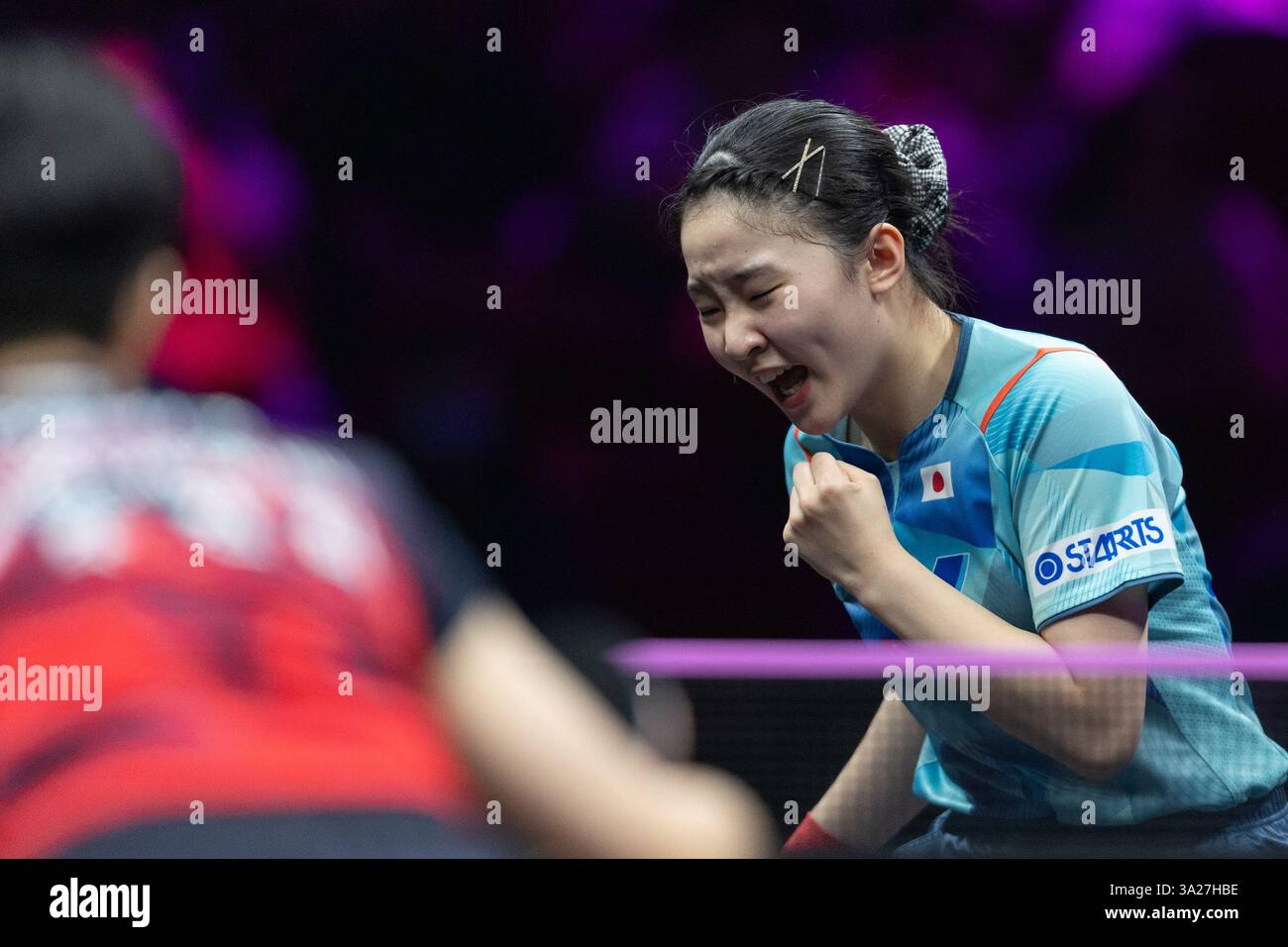 Chongqing, China. 12th Mar, 2025. Harimoto Miwa of Japan celebrates ...
