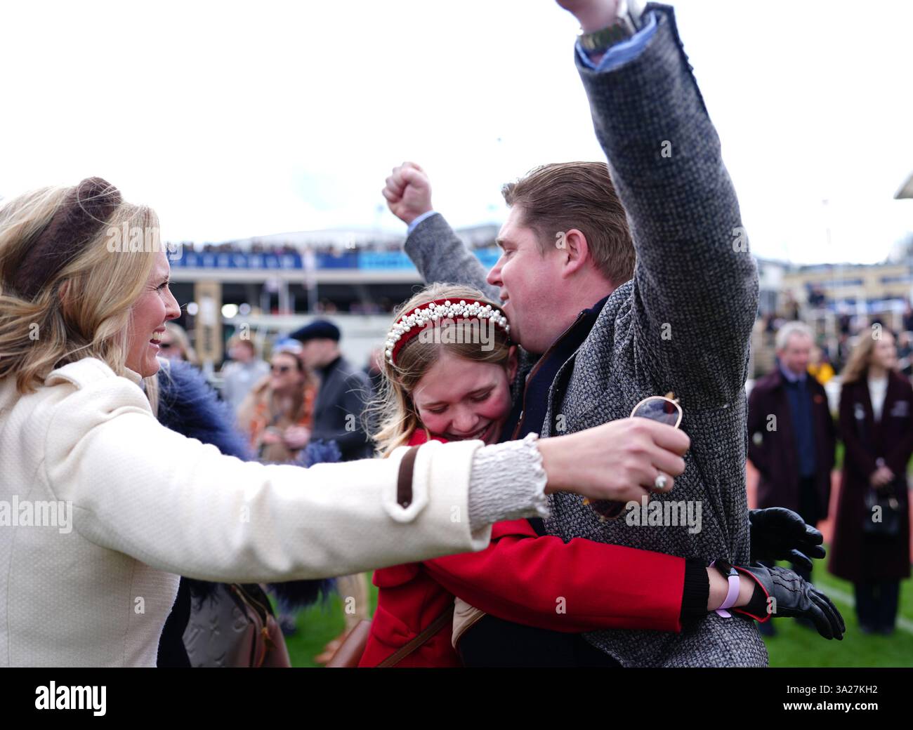 Trainer Dan Skelton (centre) celebrates in the winner's enclosure with ...