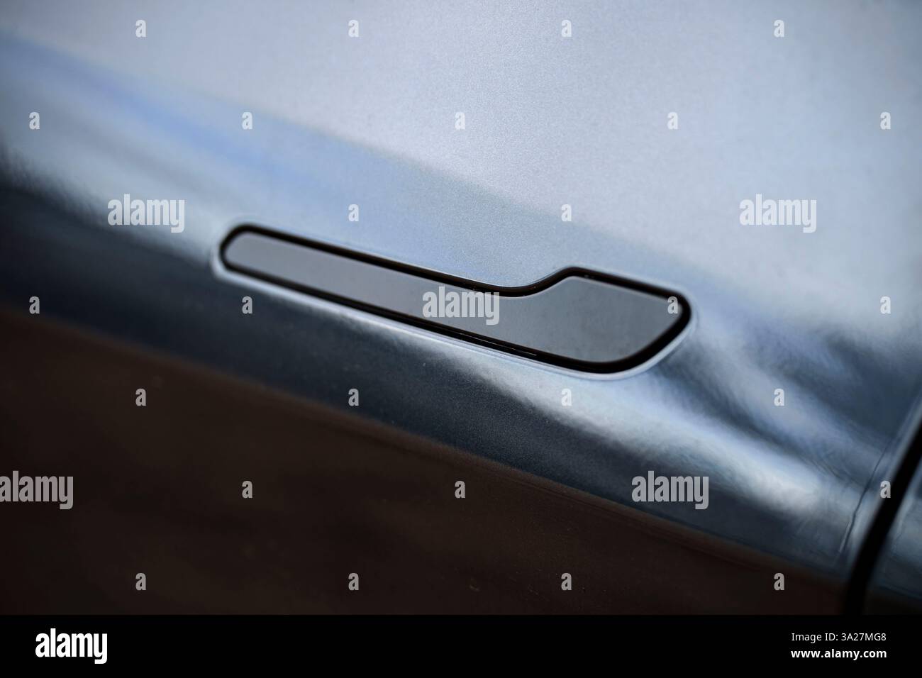 Detail of the door handles on a Tesla electric vehicle Stock Photo - Alamy