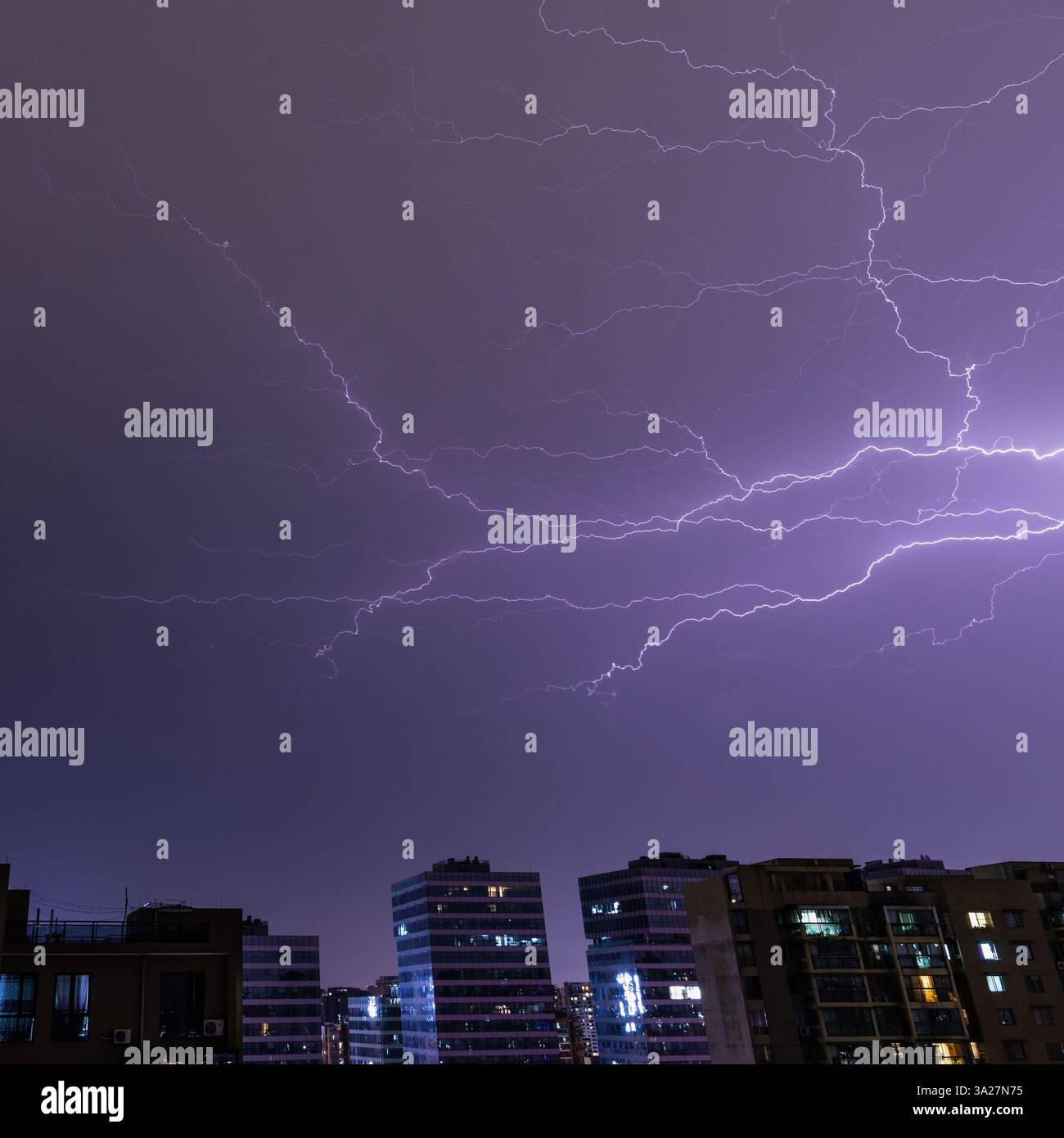 Lightning is seen over the city of Hangzhou, Zhejiang province, China ...