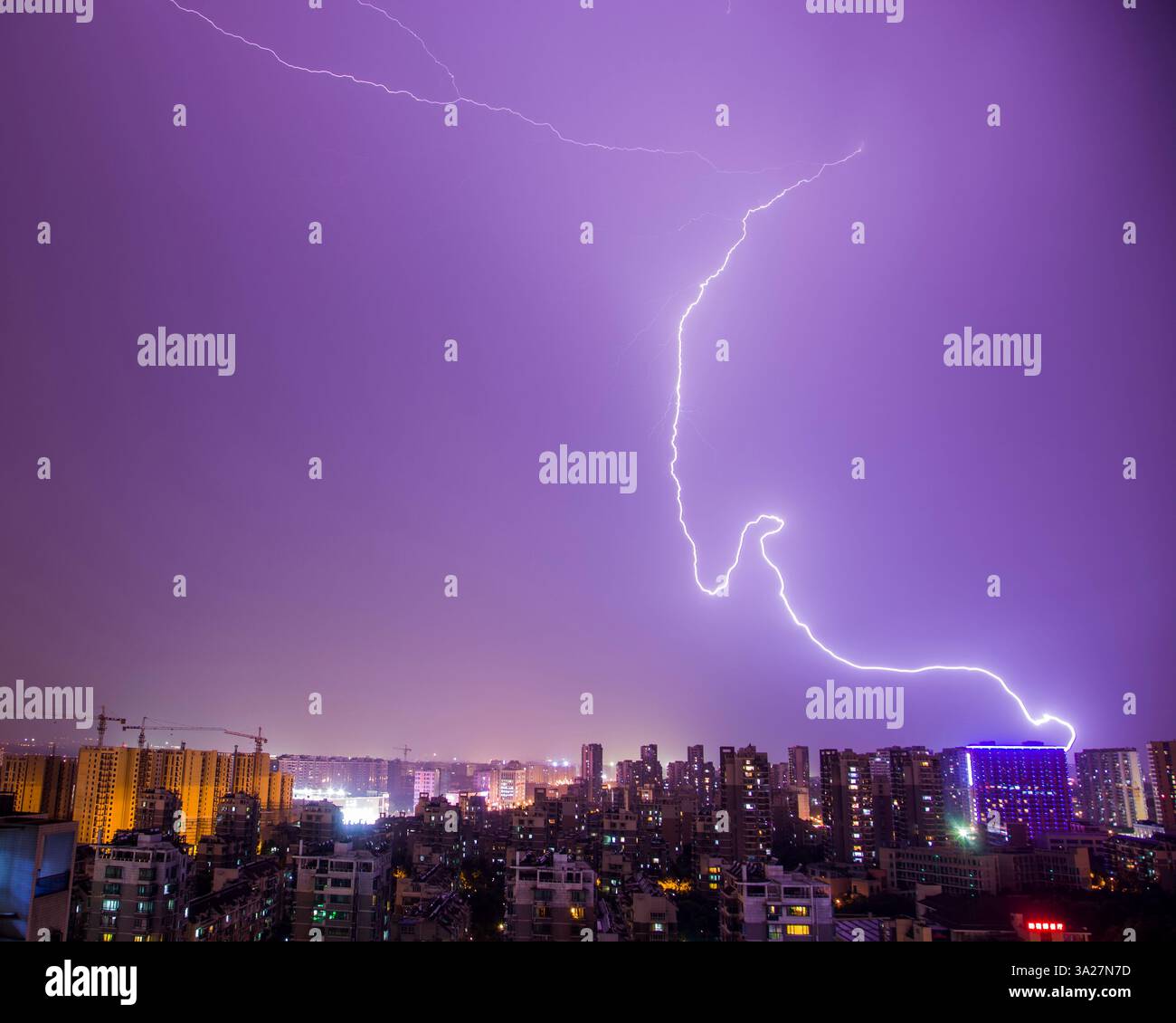 Lightning is seen over the city of Hangzhou, Zhejiang province, China ...