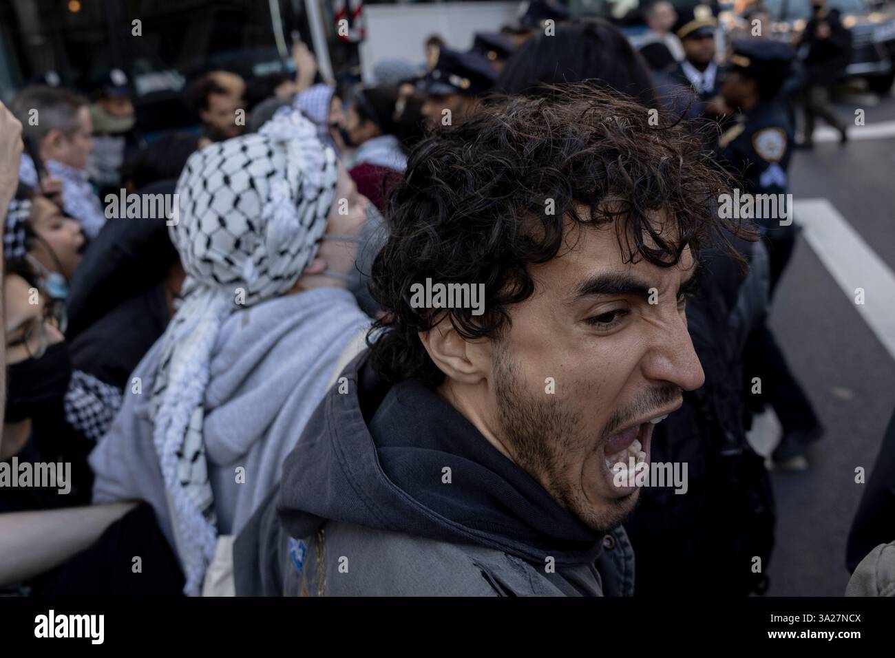 Protesters clash with NYPD officers as they demand the release of ...