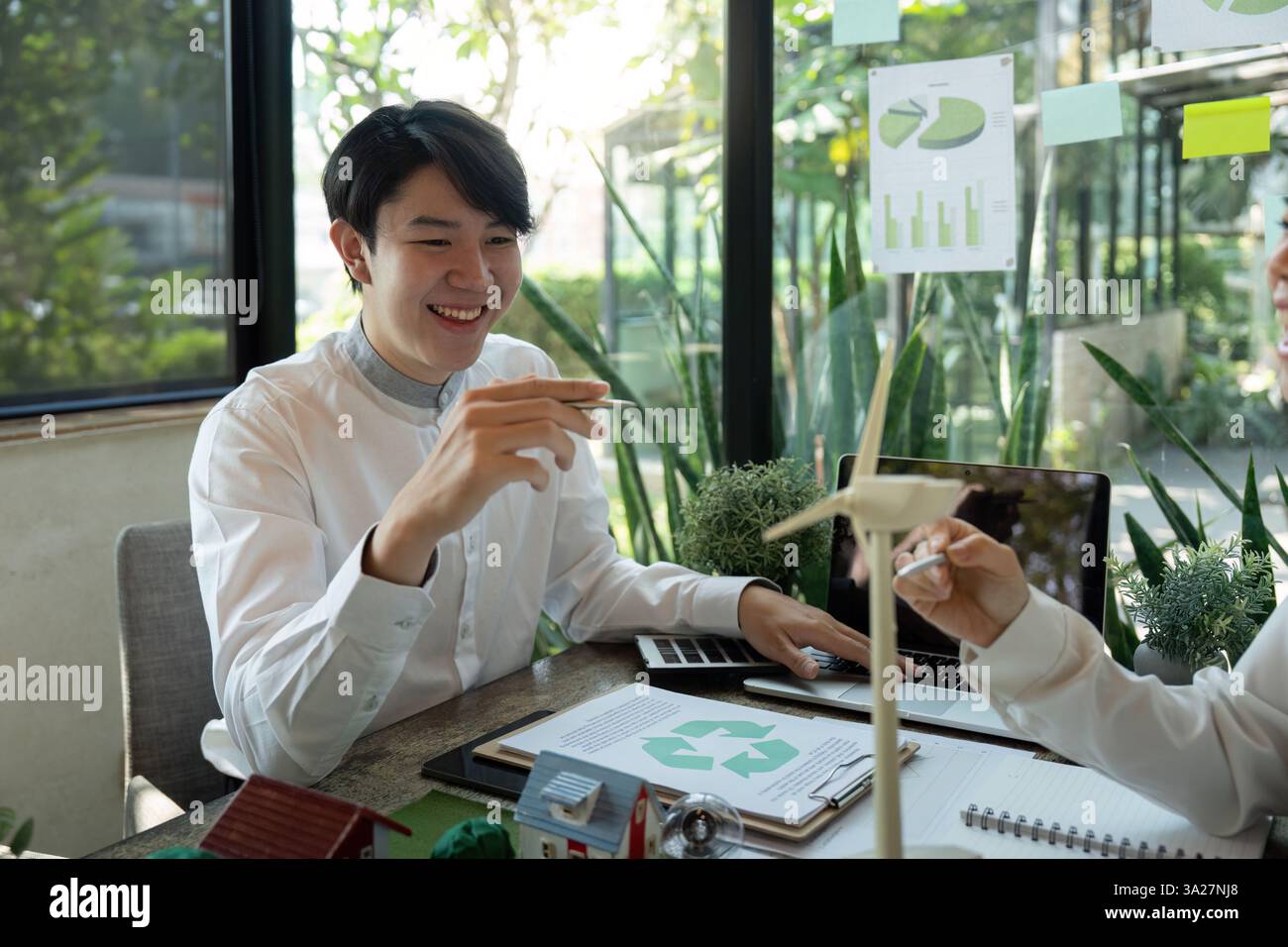 Teamwork and Green Initiatives. Engaging meeting on innovative green ...