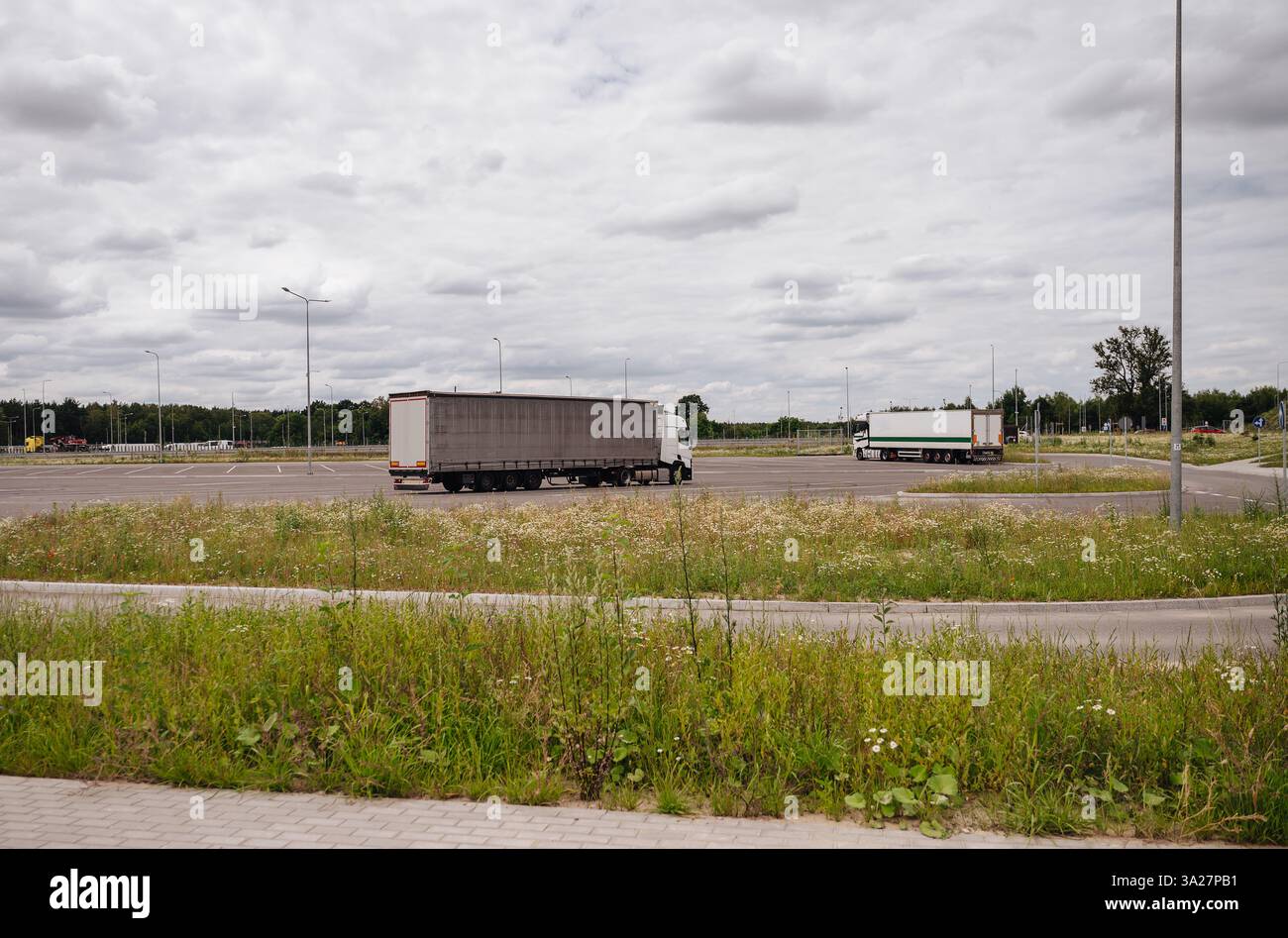 truck with black empty trailer for advertising in highway parking lot ...