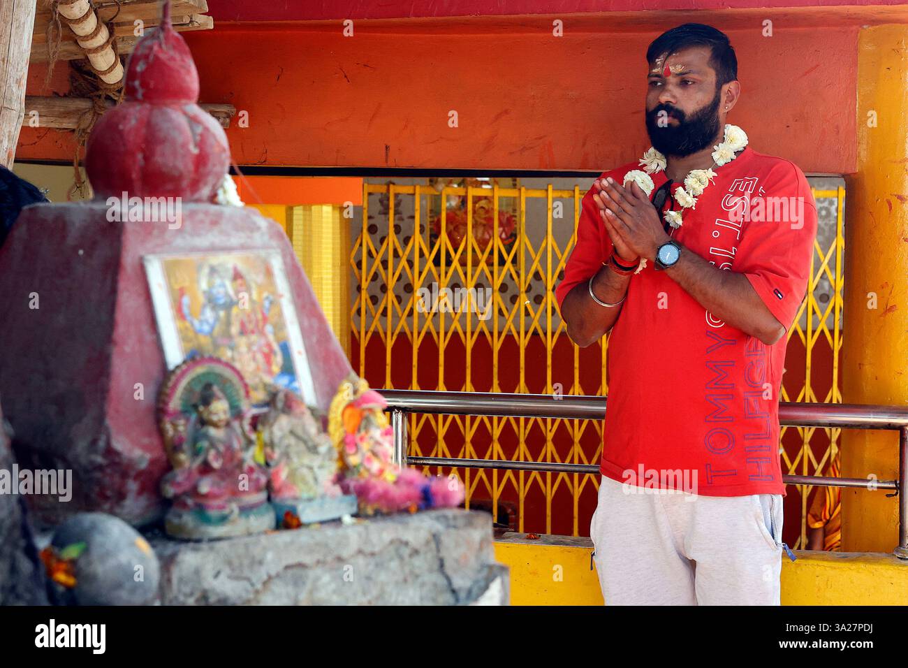 Worshipper praying at the Mahamrityunjaya Temple in Rewa, Madhya ...