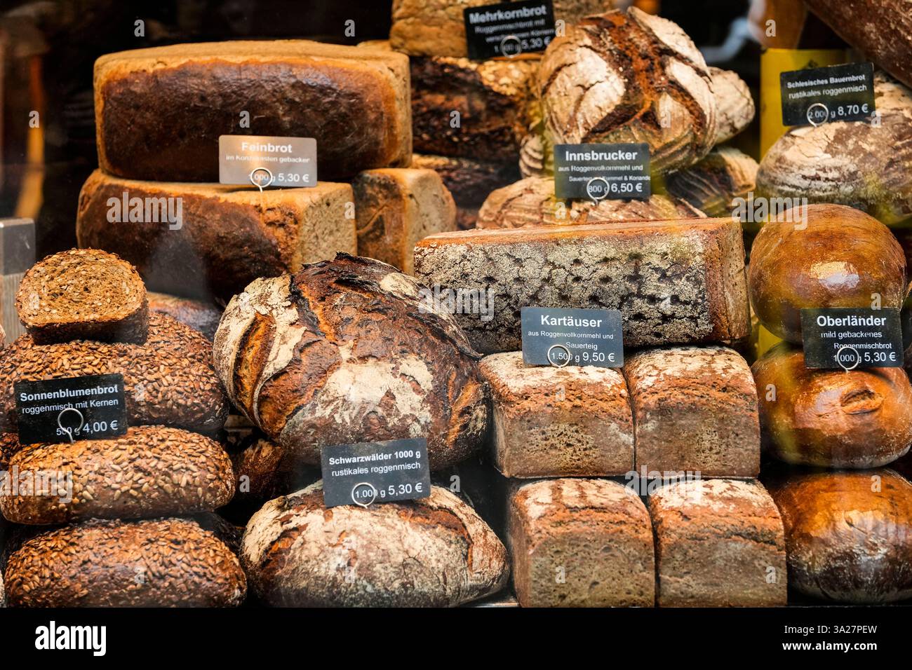 Price tags are placed atop of German bread at a bakery in Duesseldorf ...