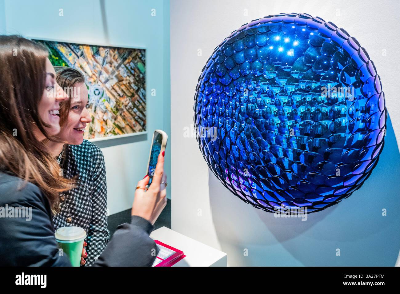 London, UK. 12 Mar 2025. Work by Eelco Hilgersom, made of sunglass ...