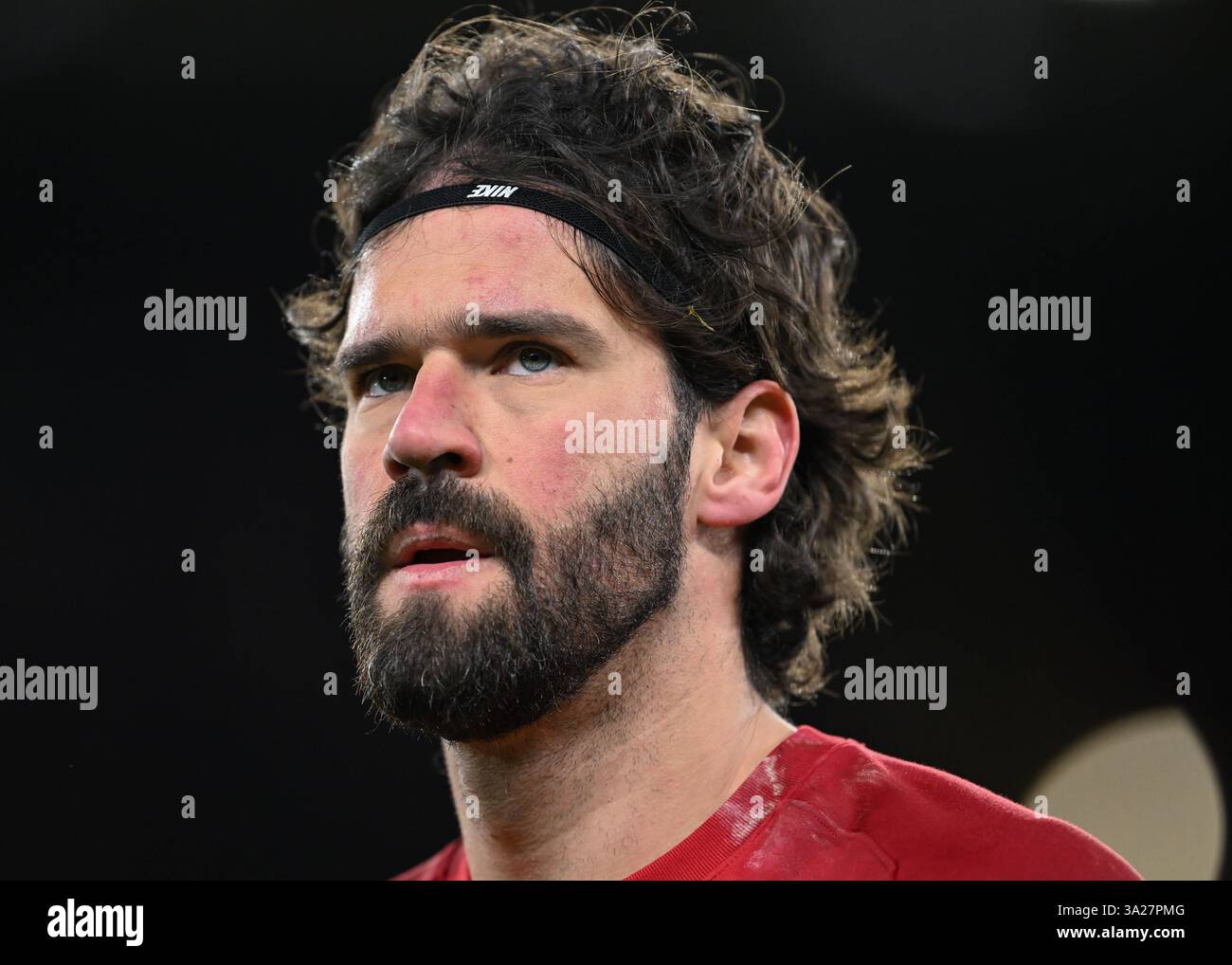 Liverpool, UK. 11th Mar, 2025. Alisson Becker of Liverpool warms up ...