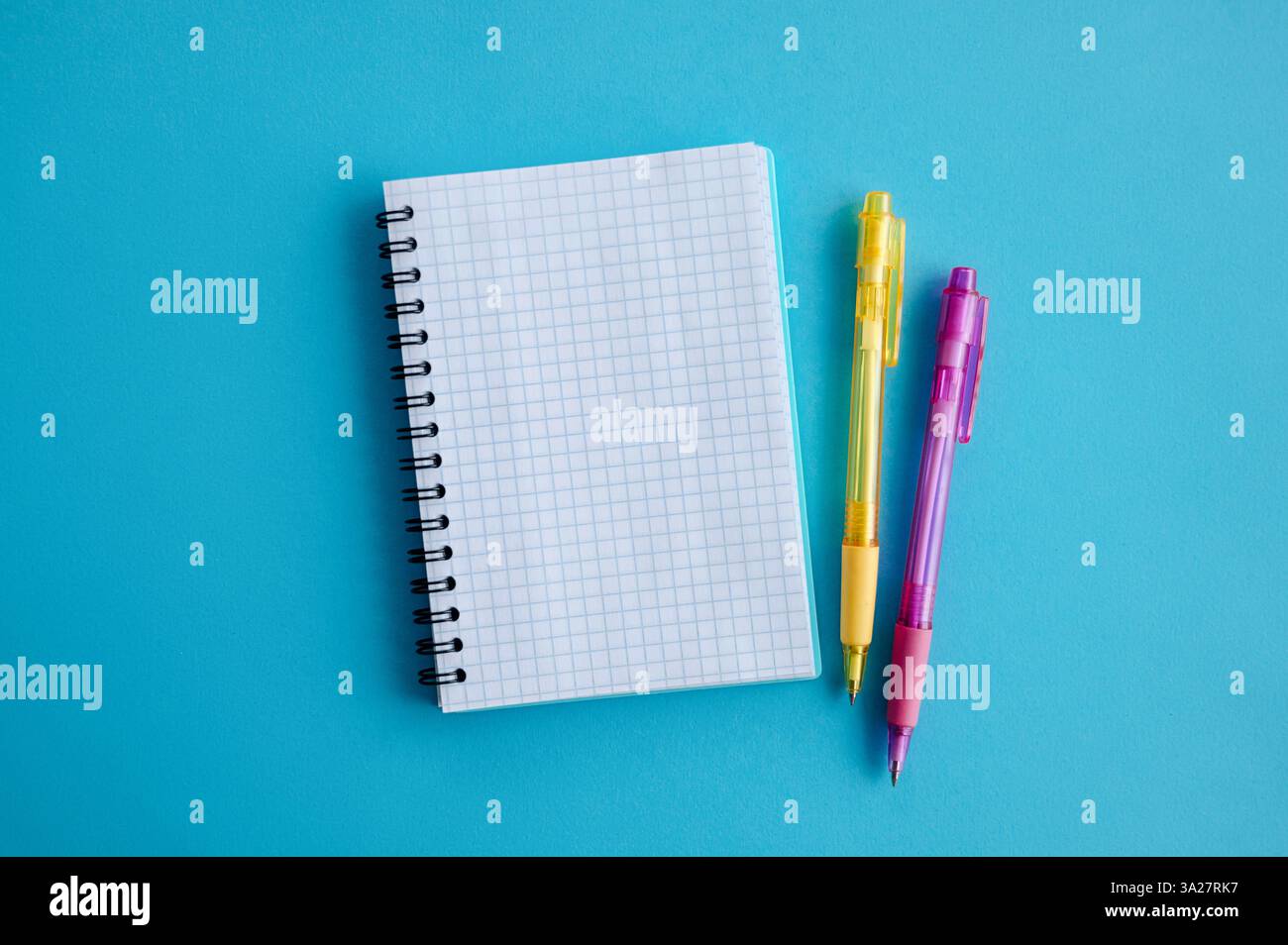 spiral notebook for writing down goals and plans and a pen. High ...
