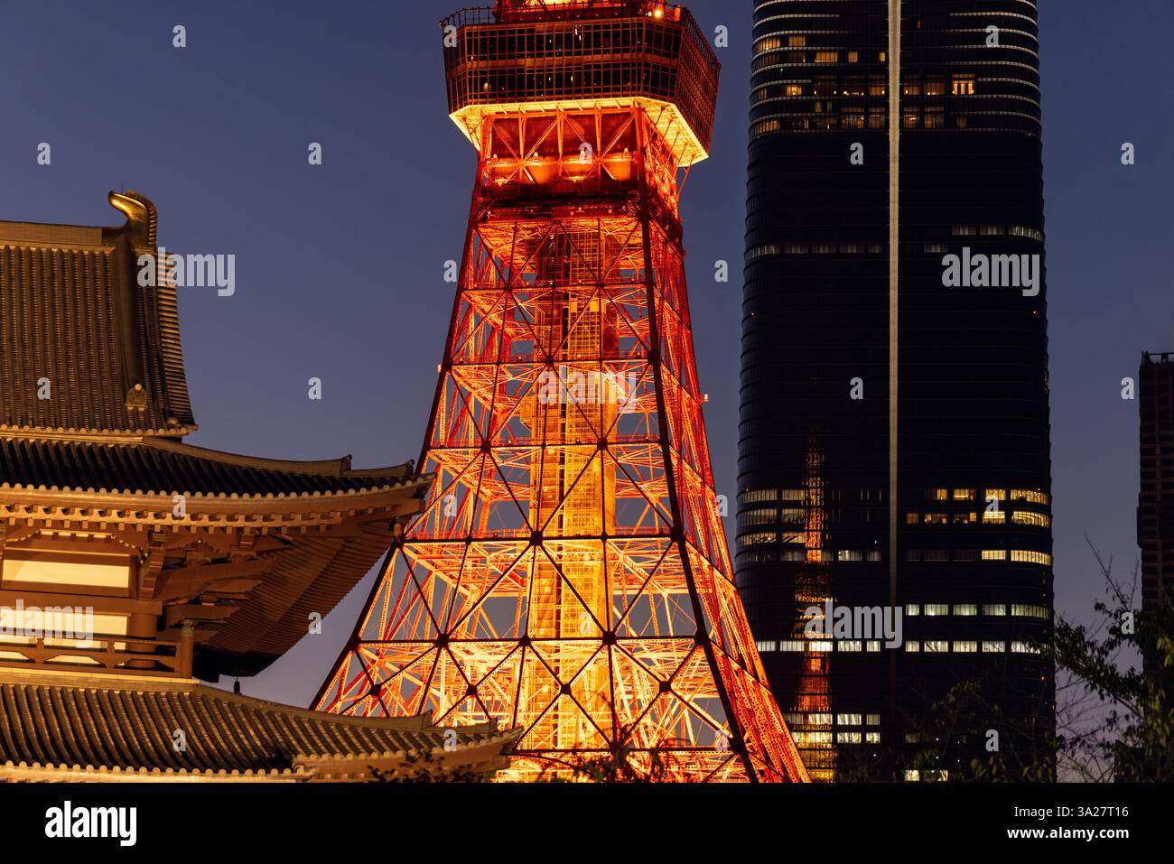 Close-up evening view of Tokyo Tower with its illuminated steel ...