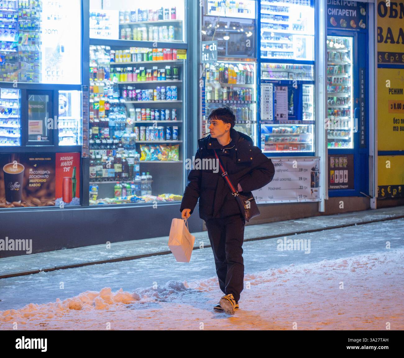 Kyiv, Ukraine - 2d March, 2025: People navigate the snowy streets of ...