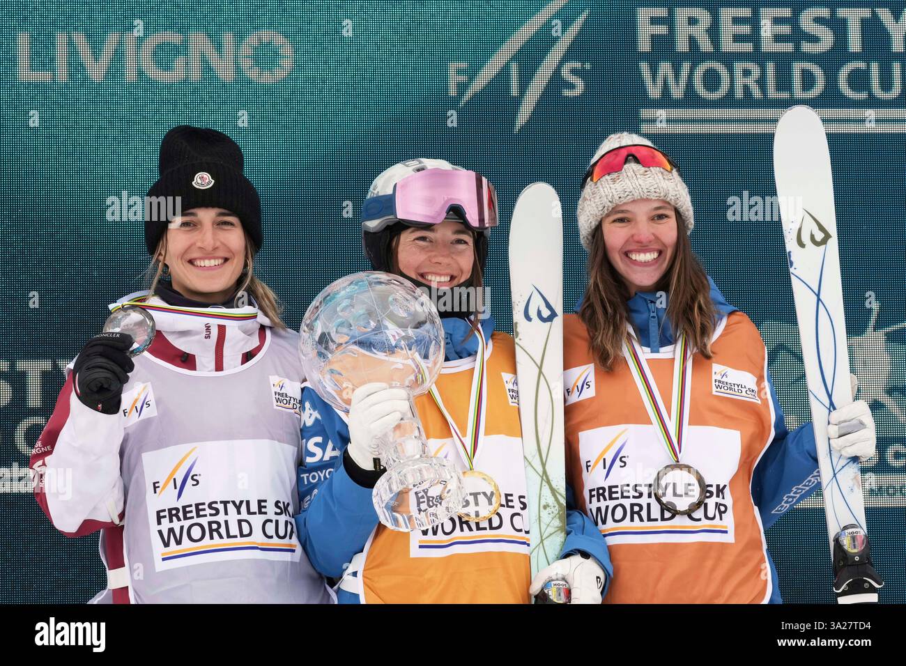 United States' Jaelin Kauf center, celebrates on the podium after ...