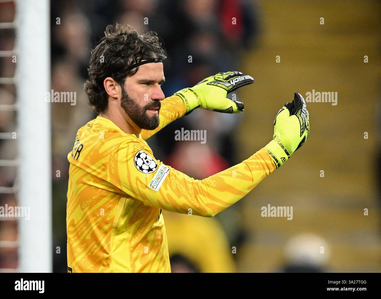 Liverpool, UK. 11th Mar, 2025. Alisson Becker of Liverpool gestures ...
