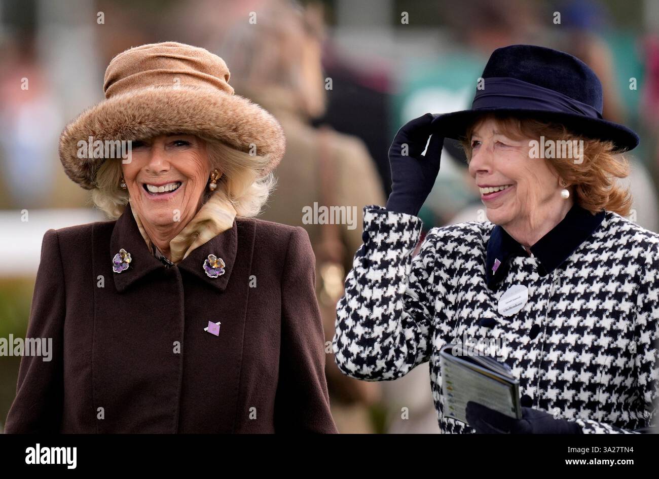 Queen Camilla (left) and Lady Sarah Keswick in the parade ring on day ...