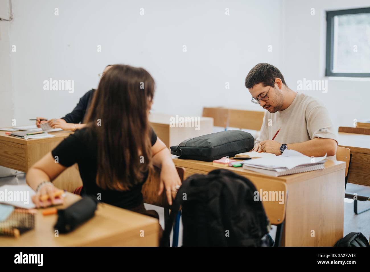High school students focused on learning in classroom setting Stock ...